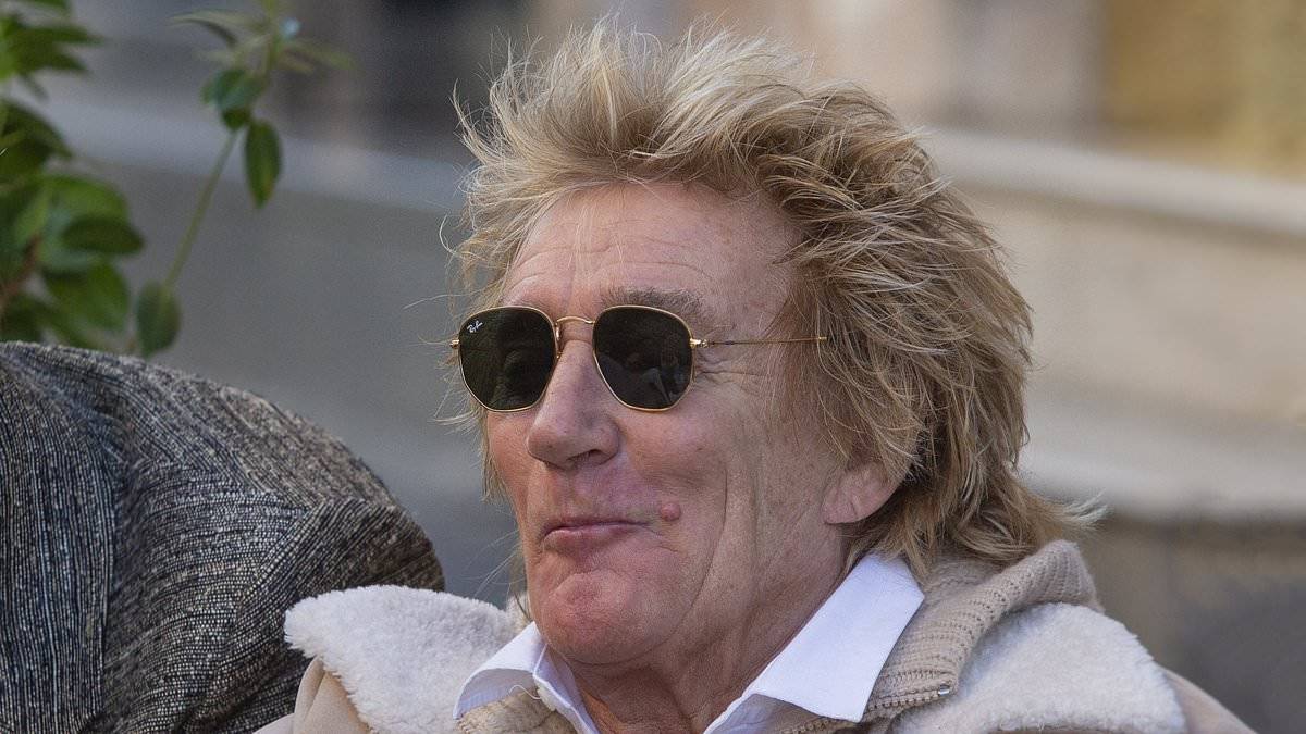 Rod Stewart, 78, looks cheerful while tucking into an ice cream cone ...